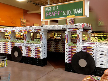 School bus display helps drive grape sales at Broulim's | Produce News